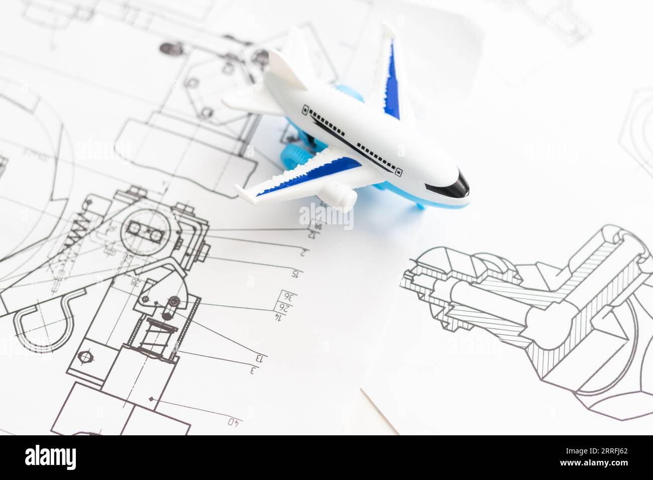 Miniature model airplane on a flight sectional map with focus on the ...