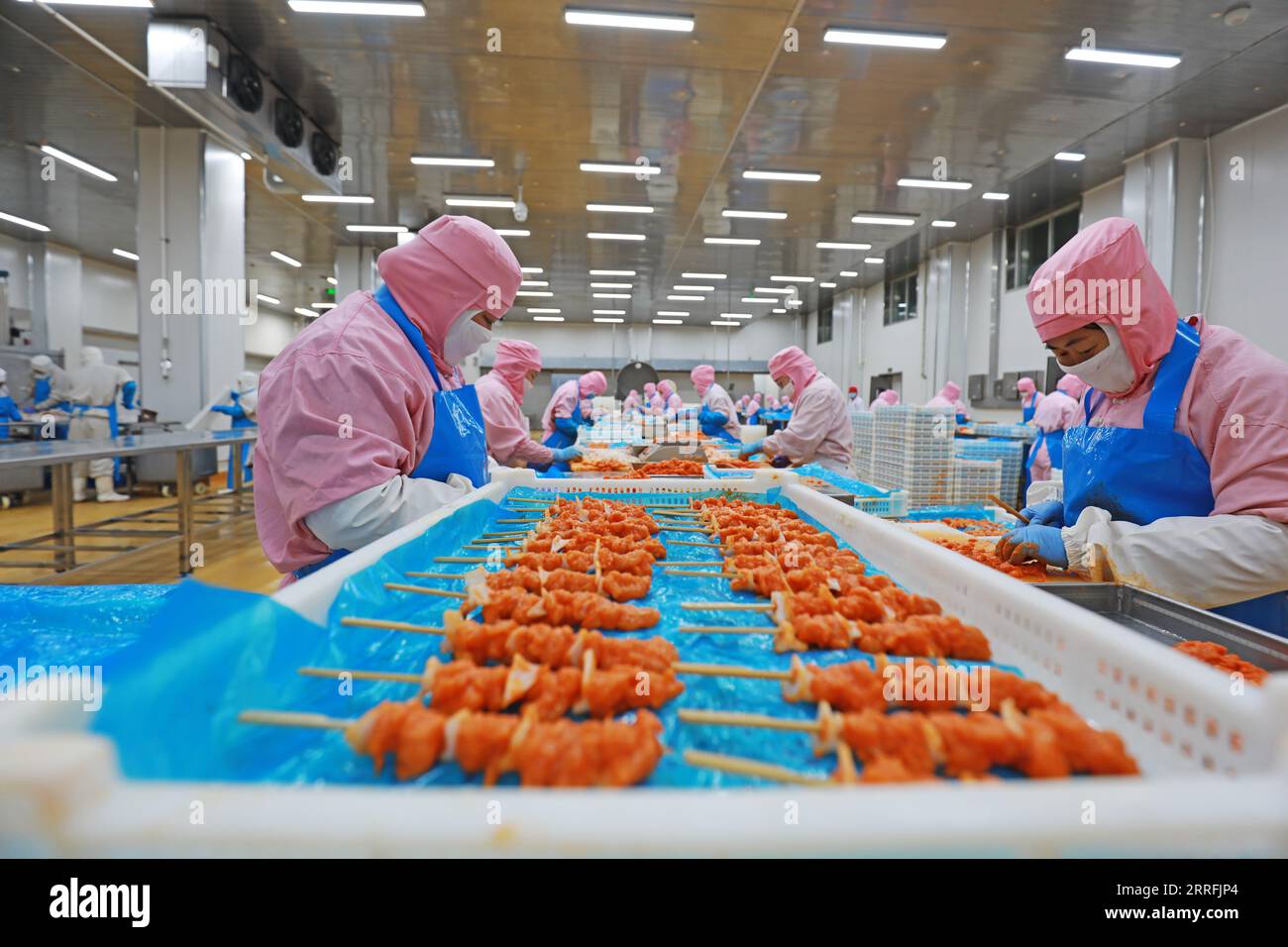 LUANNAN COUNTY, Hebei Province, China - July 28, 2020: Workers are busy ...