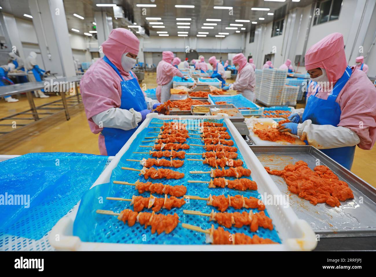 LUANNAN COUNTY, Hebei Province, China - July 28, 2020: Workers are busy ...
