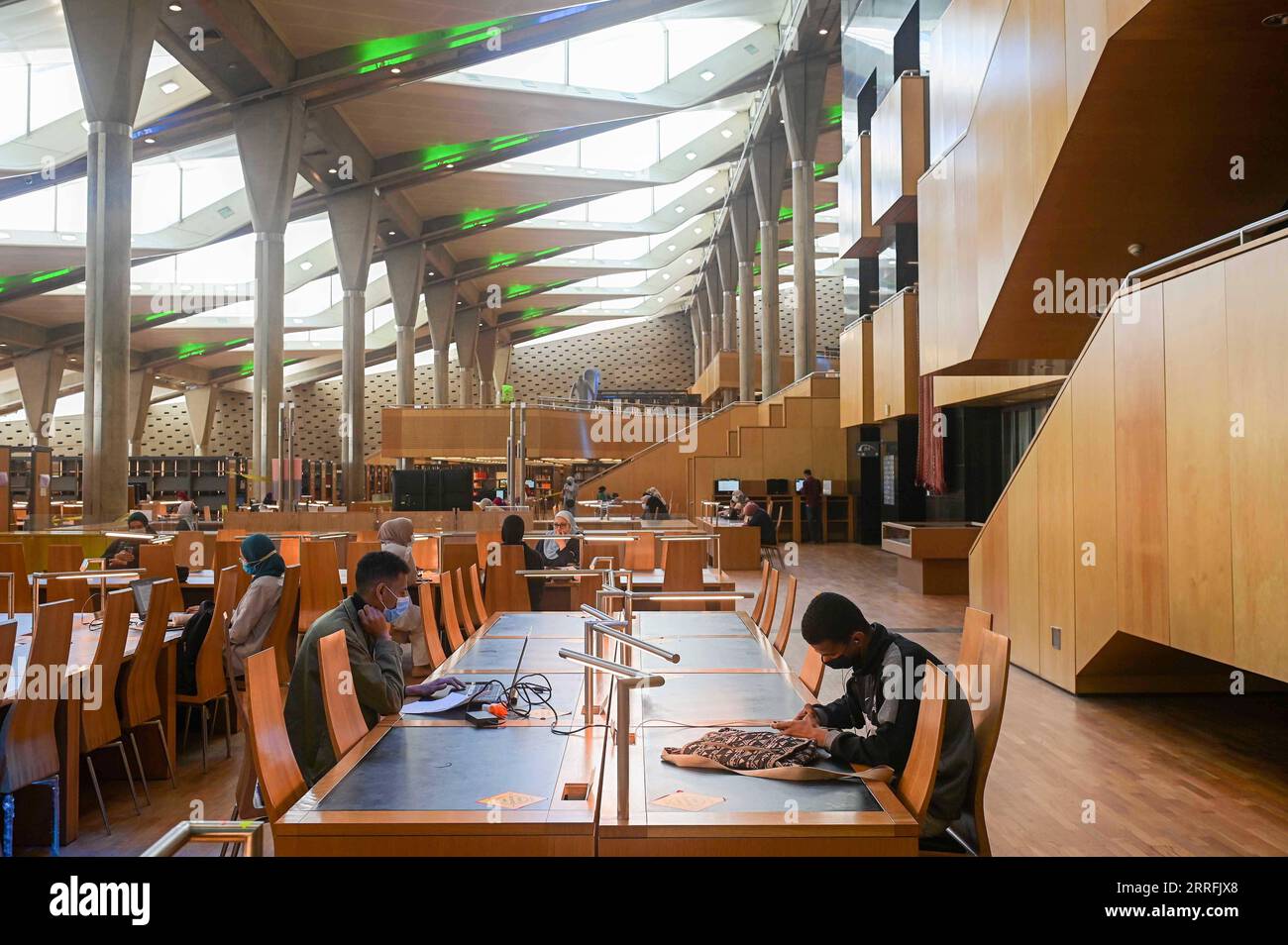 220420 -- CAIRO, April 20, 2022 -- People study at the Bibliotheca ...