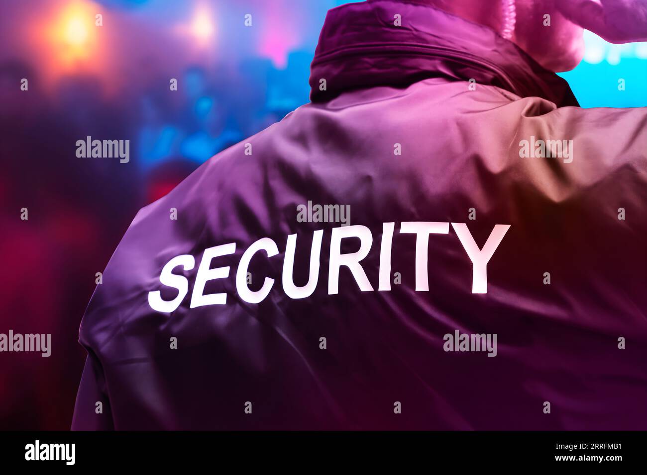 Male Security Officer Wearing Cap Trying To Listen Something On ...