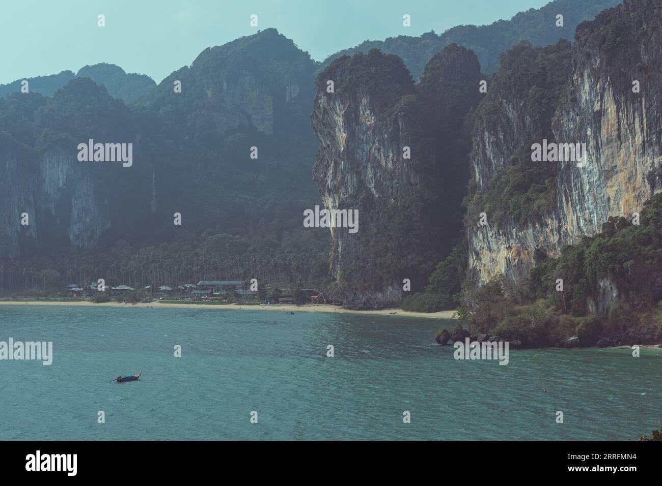 Faraway limestone rocks and tropical vegetation at Tonsai Beach at ...
