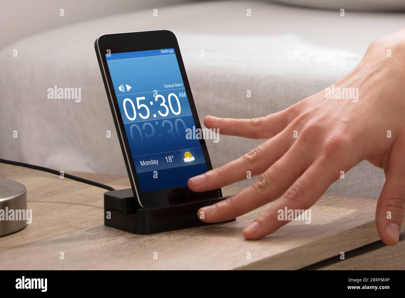 Person turning off phone clock hi-res stock photography and images - Alamy
