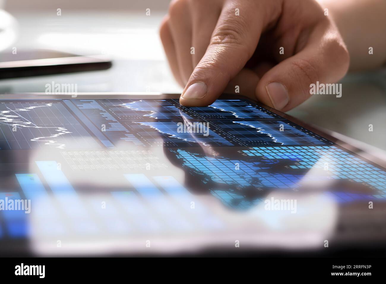 Investor KPI Analytics Graph. Hand Pointing At Data Stock Photo - Alamy