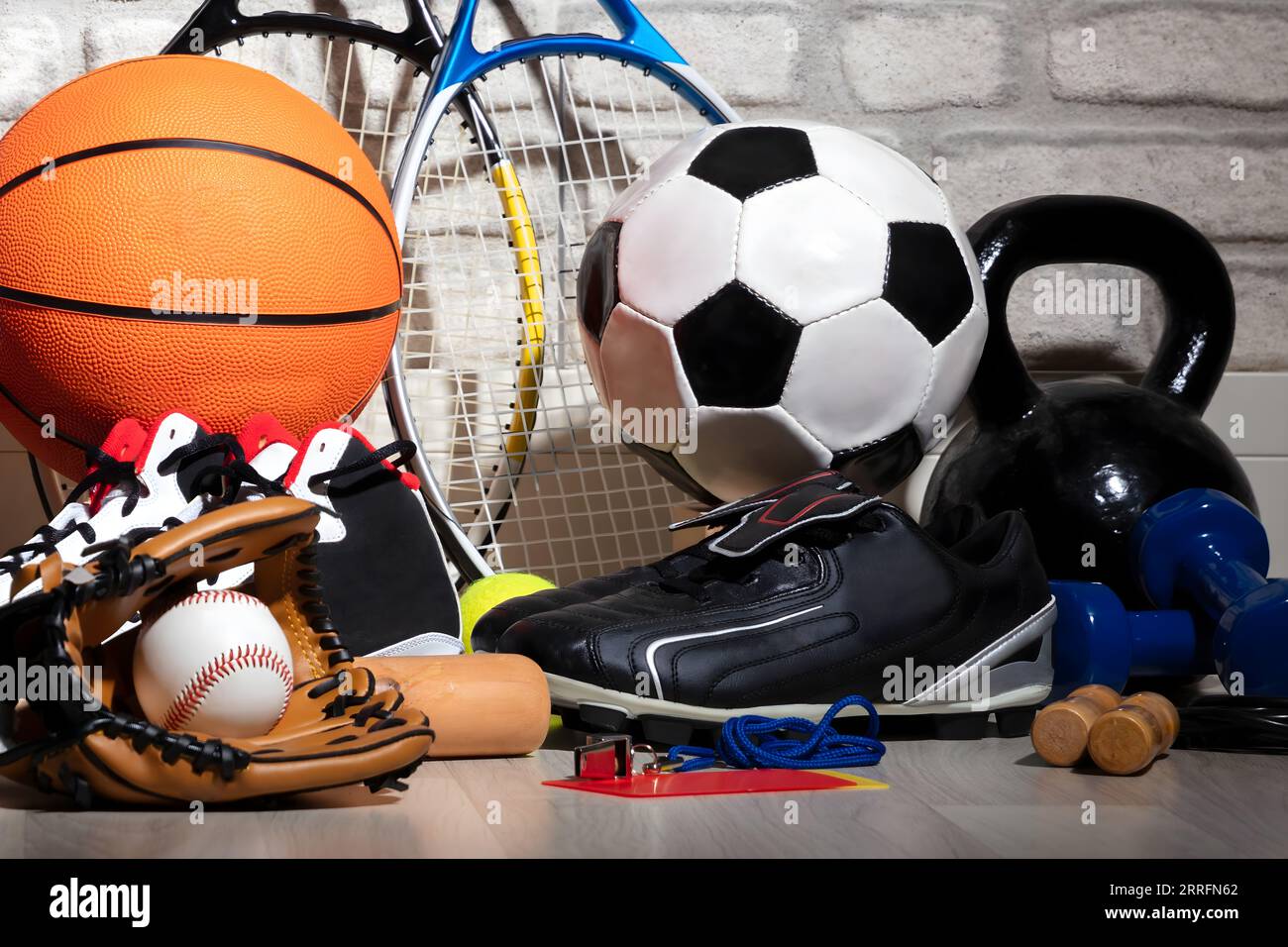 Variety Of Sport Balls And Equipment In Front Of Black Surface Stock ...