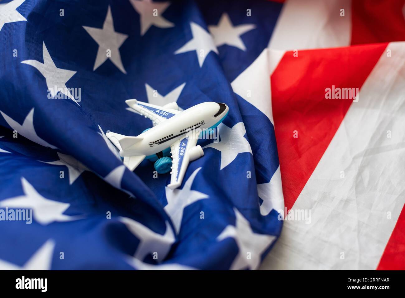 toy jet plane and flag of USA Stock Photo - Alamy
