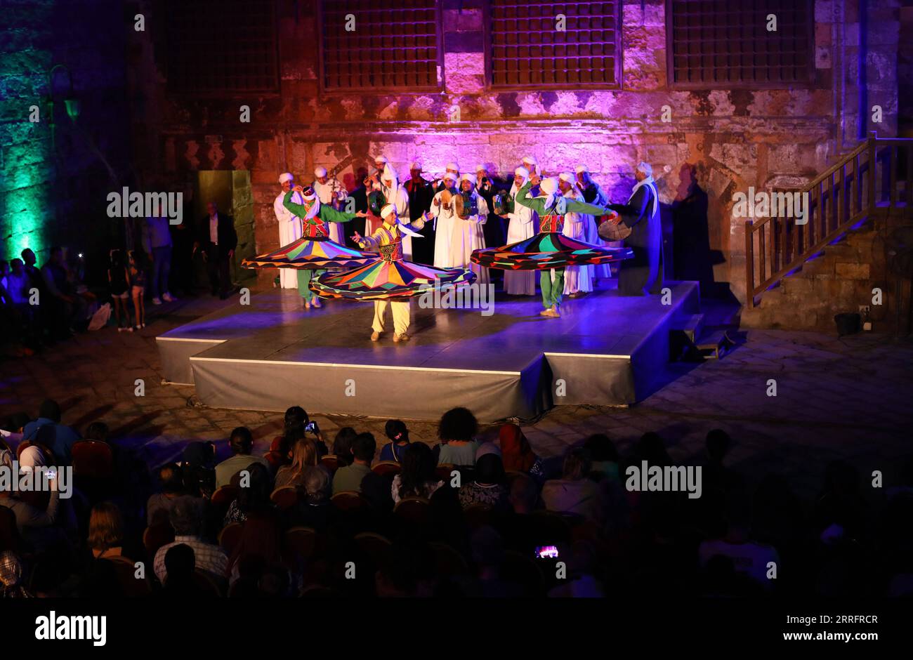 220424 -- CAIRO, April 24, 2022 -- People watch Tanoura, a traditional ...