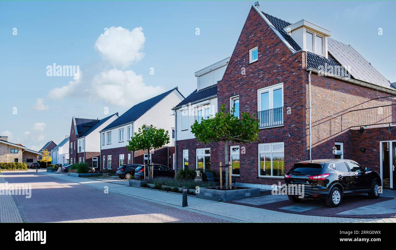 Dutch Suburban area with modern family houses, newly built modern ...