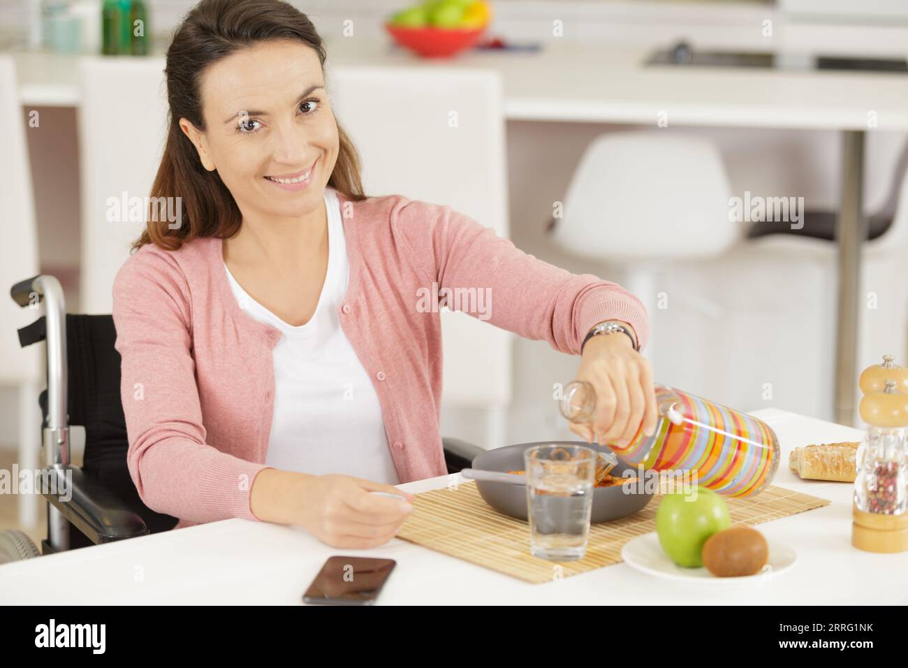 Woman pouring water on hi-res stock photography and images - Alamy