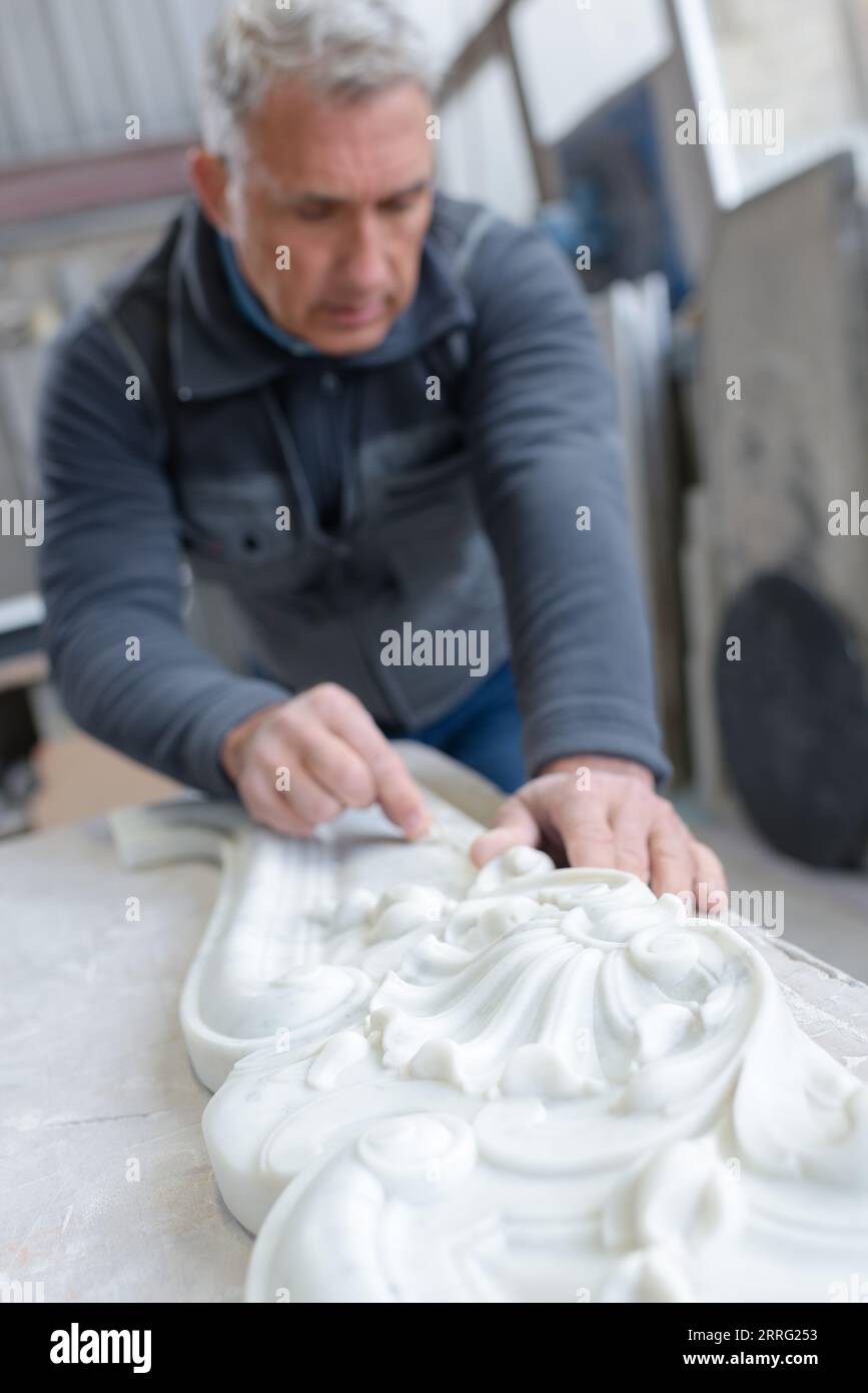 Man sculptor making marble hi-res stock photography and images - Alamy