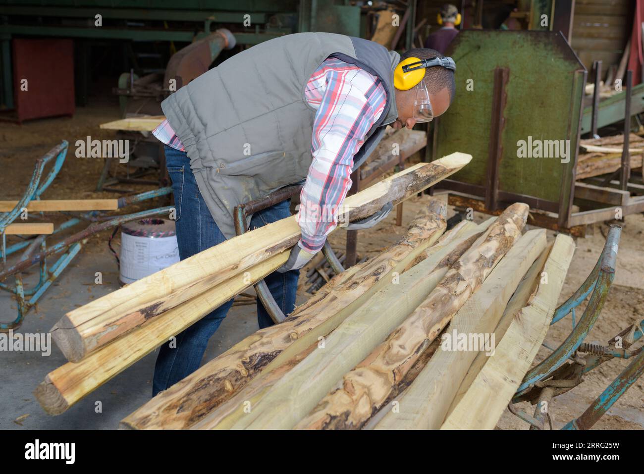 a carpenter is outside workshop Stock Photo - Alamy