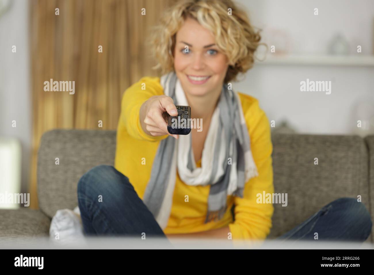 tv control in woman hands Stock Photo - Alamy