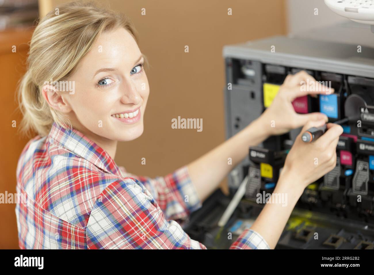 Woman photocopy machine hi-res stock photography and images - Alamy