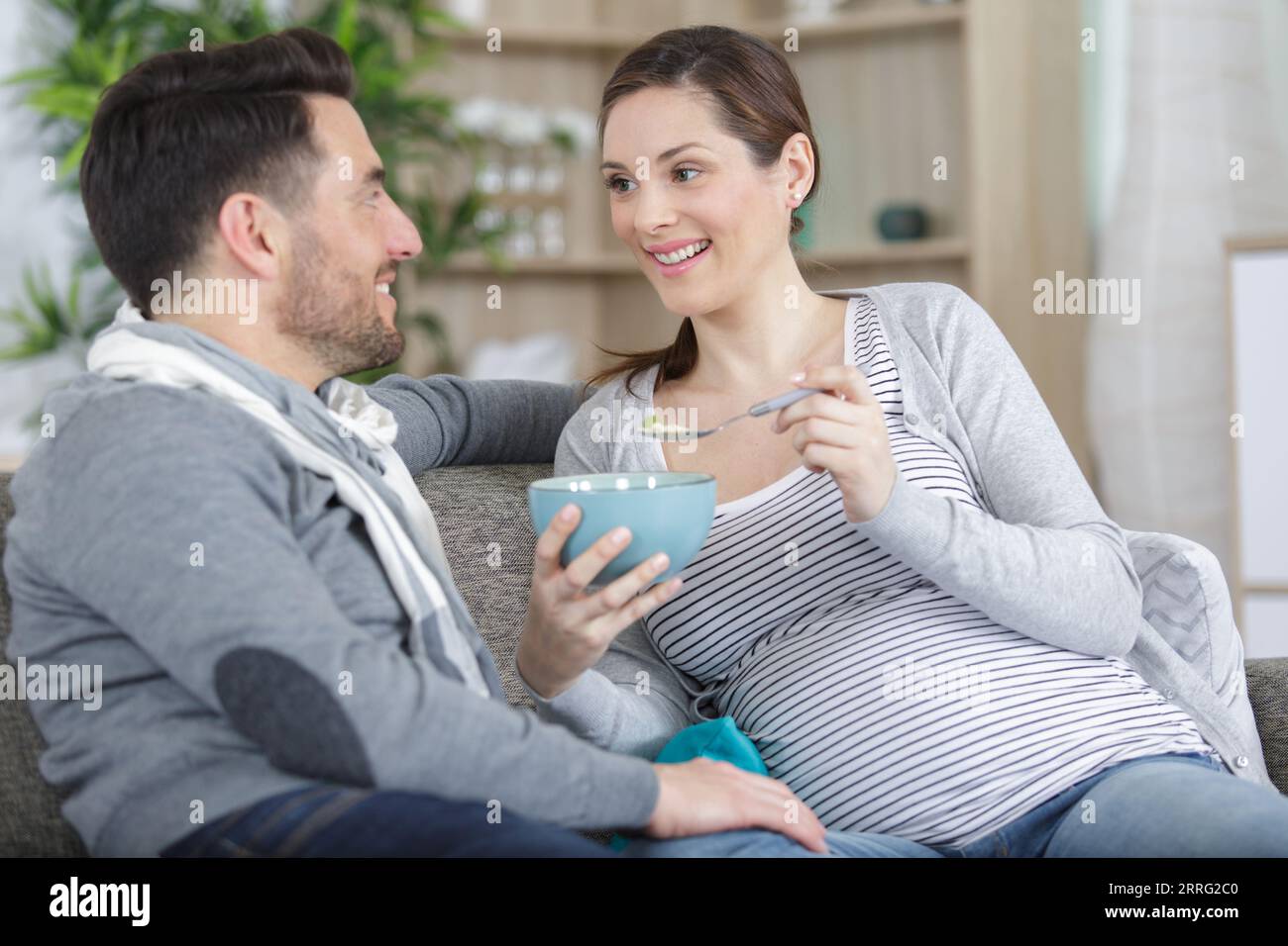 Man eating cereal on sofa hi-res stock photography and images - Alamy