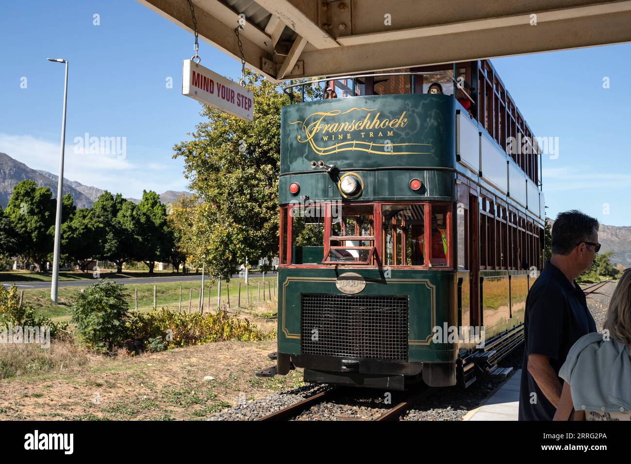 220505 -- FRANSCHHOEK, May 5, 2022 -- A wine tram arrives at a terminal ...