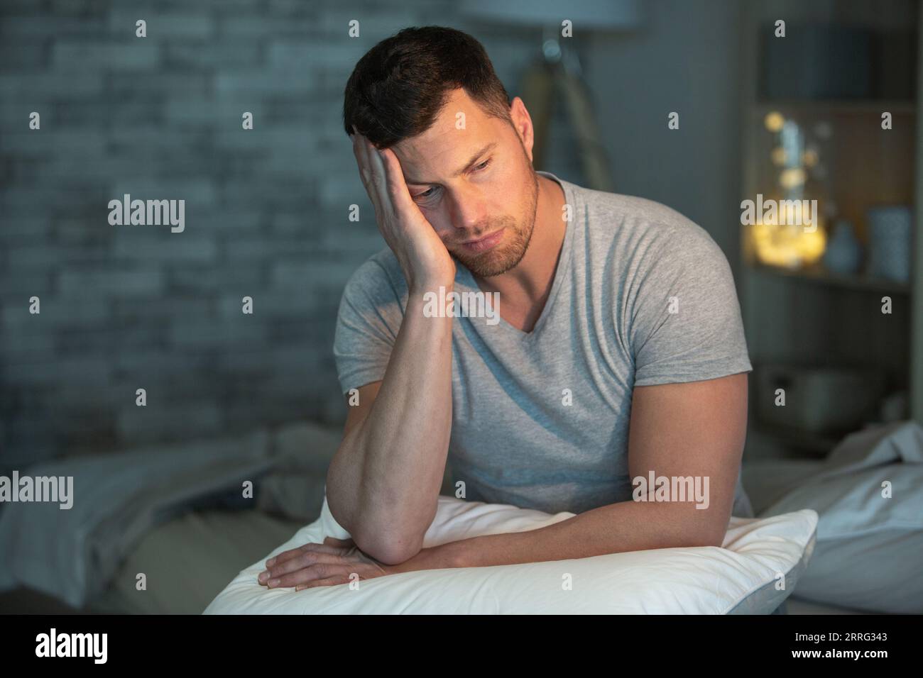 handsome man suffering insomnia cannot sleep Stock Photo - Alamy