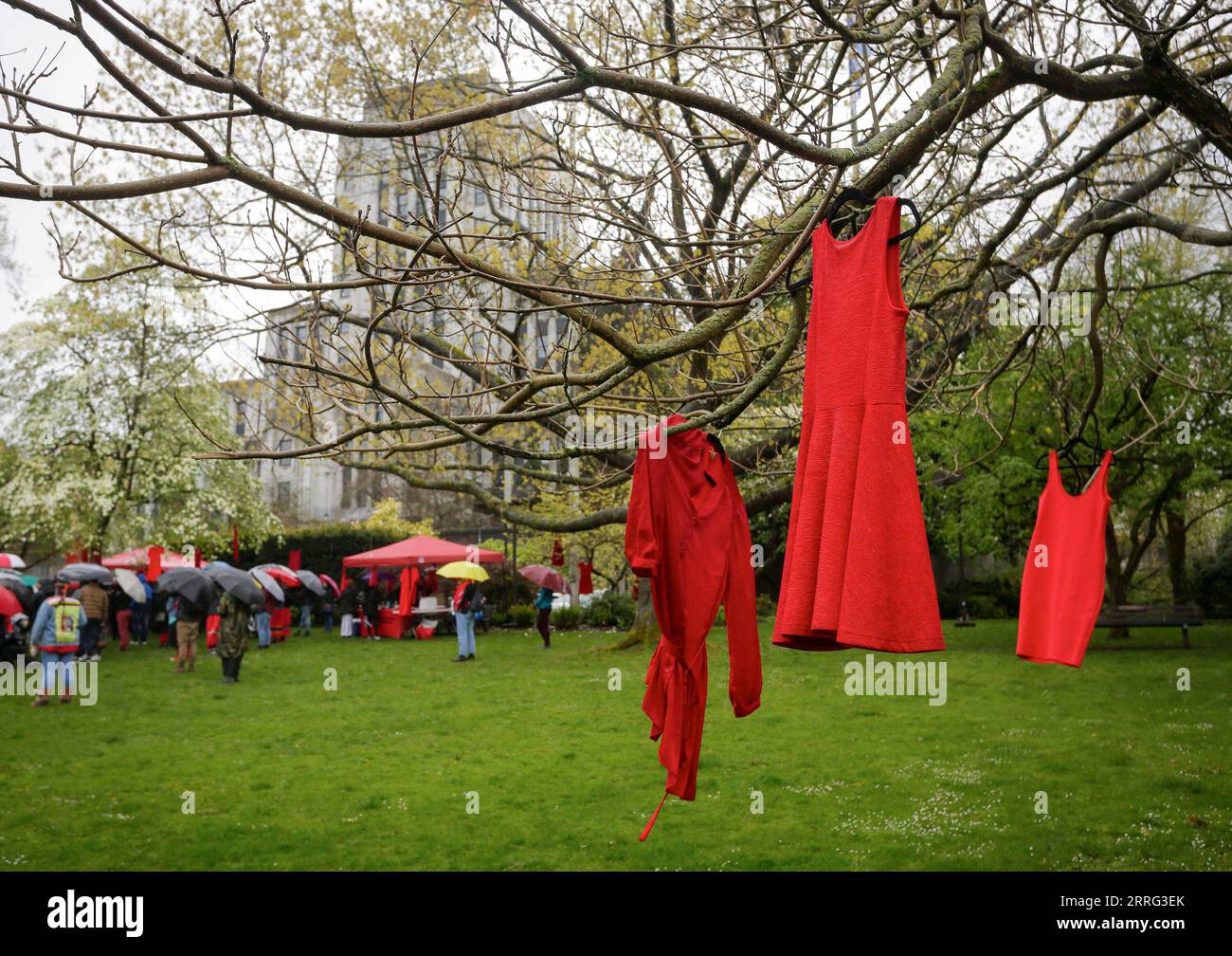 220505 -- VANCOUVER, May 5, 2022 -- Red dresses are seen during an ...
