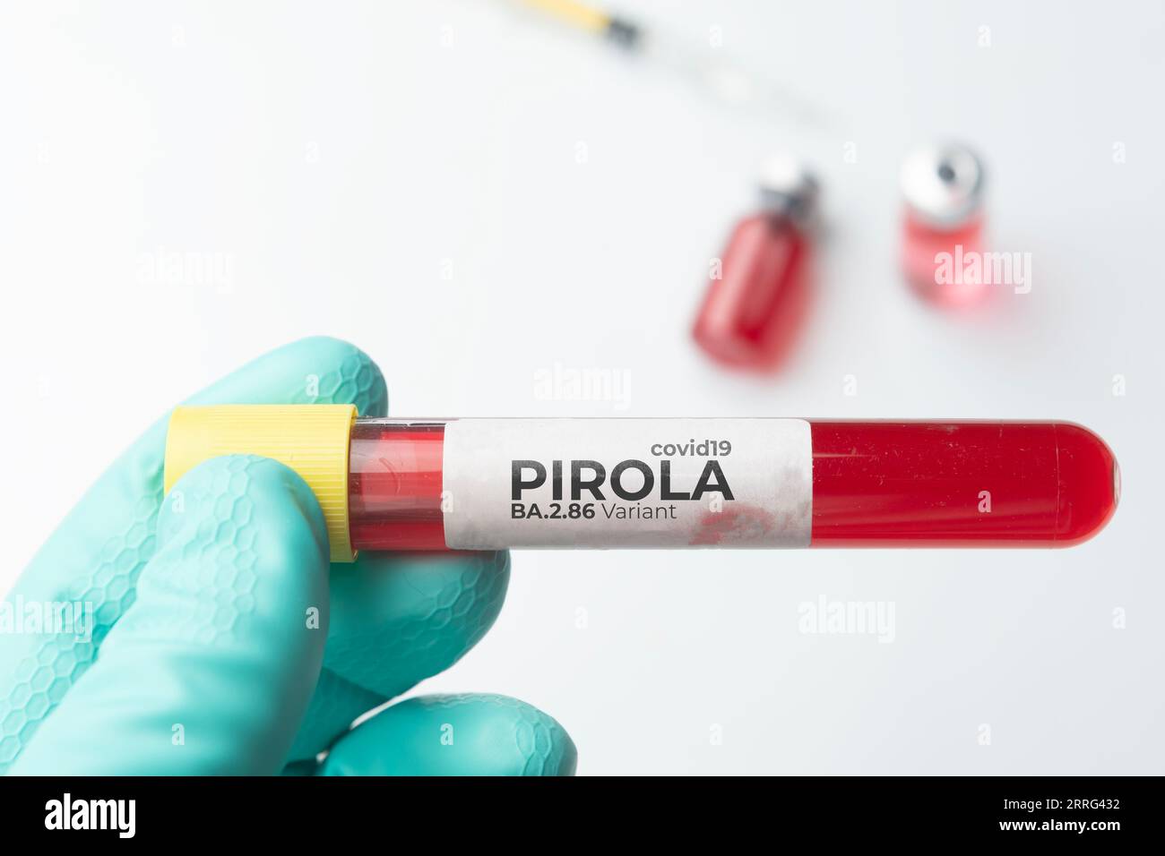 Doctor shows a sample of the Pirola variant (BA.2.86) of the covid19 ...