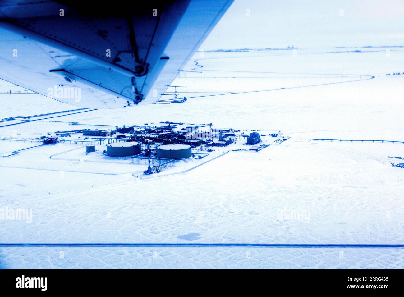 Oil pipeline and iceroad leading from the ConocoPhillips oilwells in ...