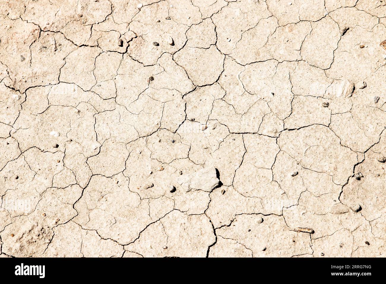 Dry ground in Desert Shores next to the Salton Sea in California. The ...