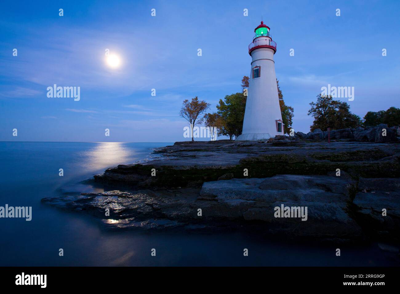 The moon rising over Lake Erie at Marblehead Lighthouse in Marblehead ...