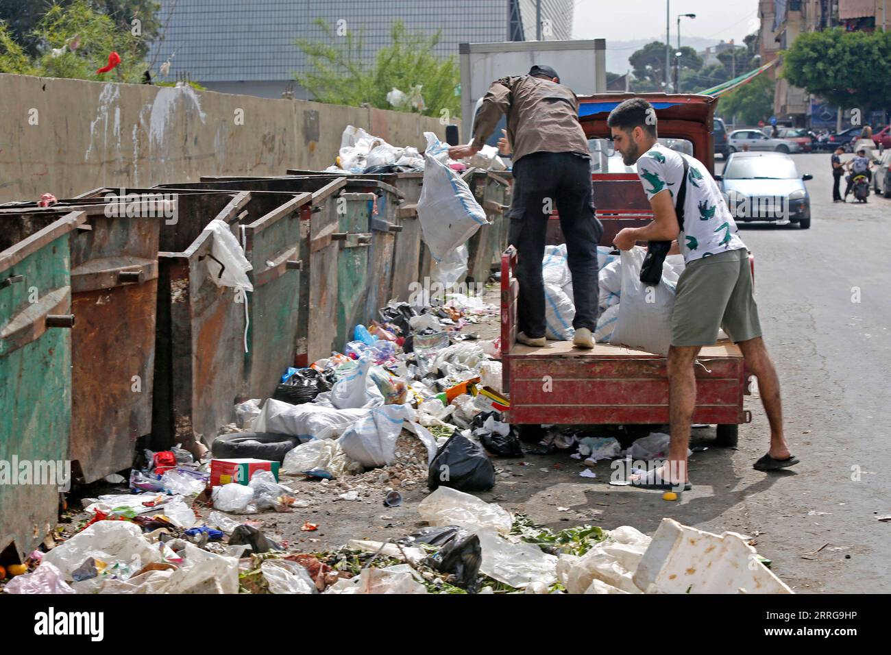 220514 -- BEIRUT, May 14, 2022 -- People dump waste in Beirut, Lebanon ...