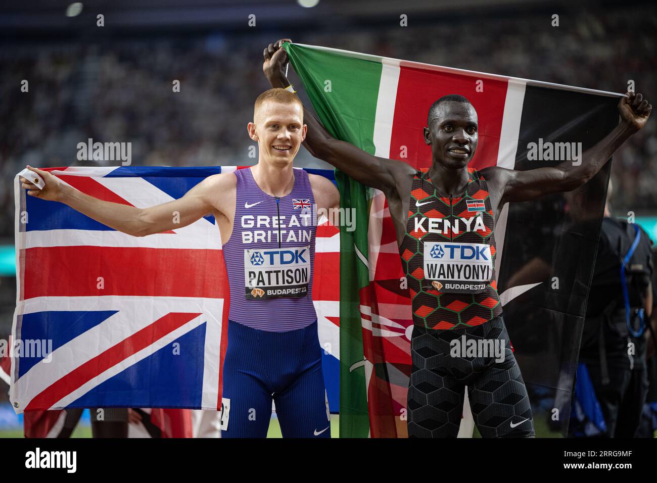 Ben Pattison celebrating her medal with her country's flag in the 800 ...
