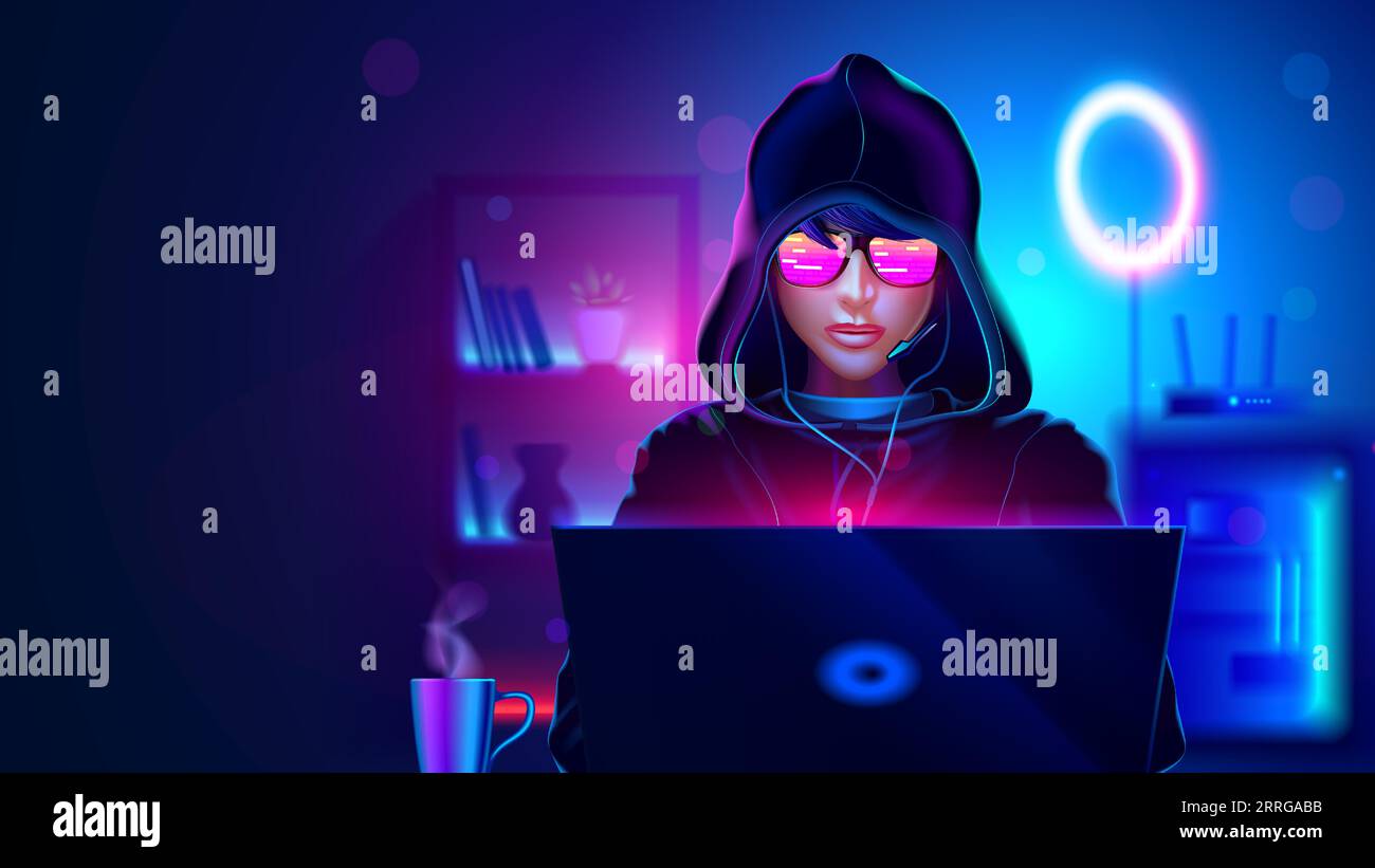 A teenage gamer in a hood is playing at a gaming laptop. A teenage girl ...