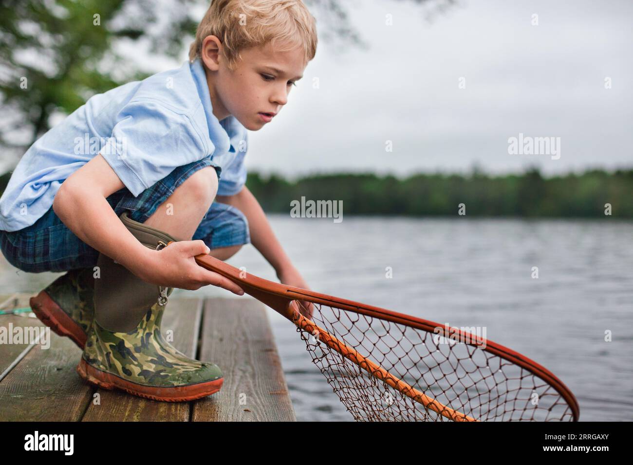 Boy dock net hi-res stock photography and images - Alamy