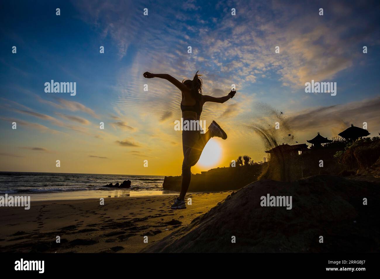 Running on the beach in Bali, Indonesia Stock Photo - Alamy