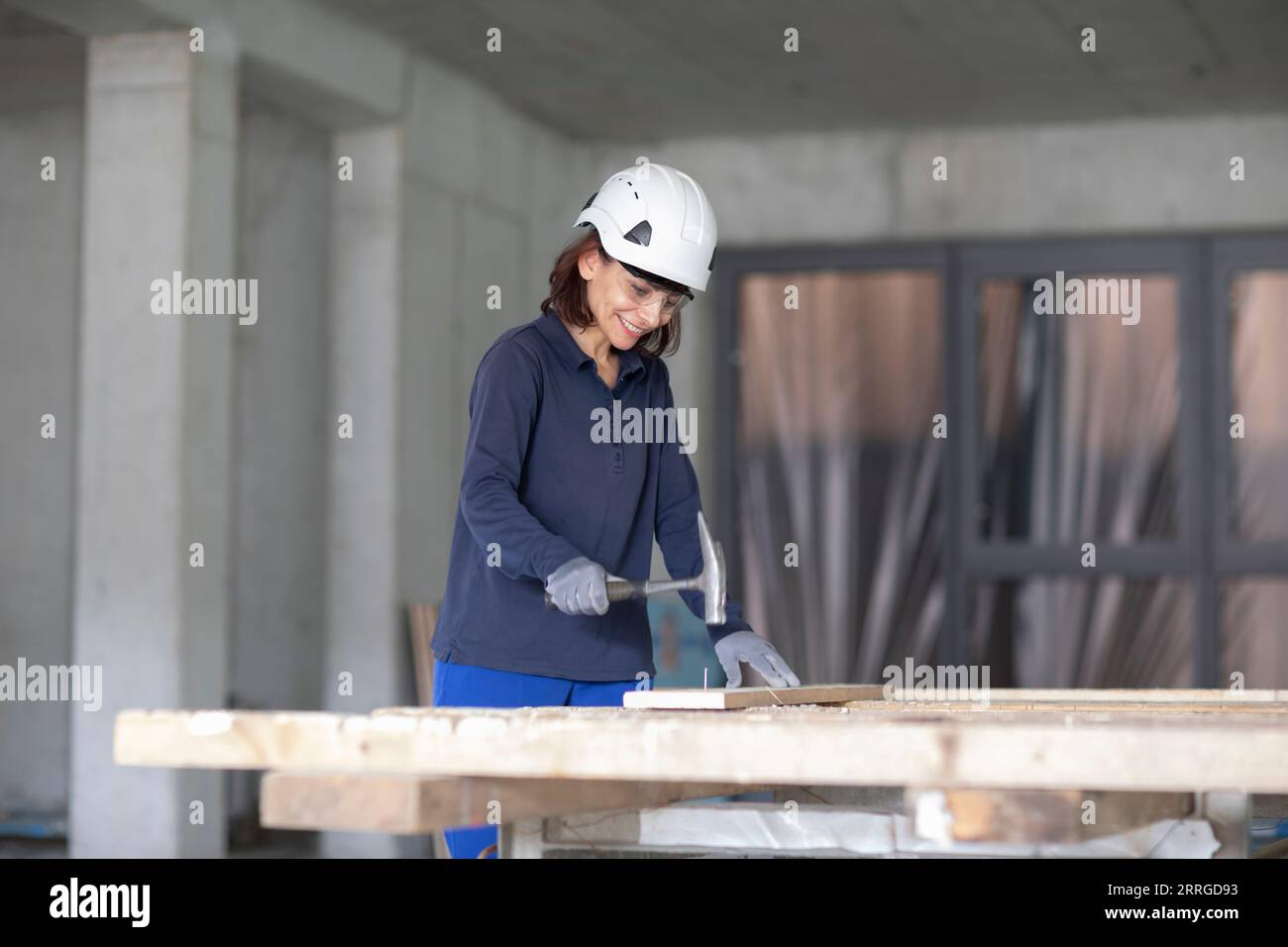 Woman with a helmet of hair hi-res stock photography and images - Alamy