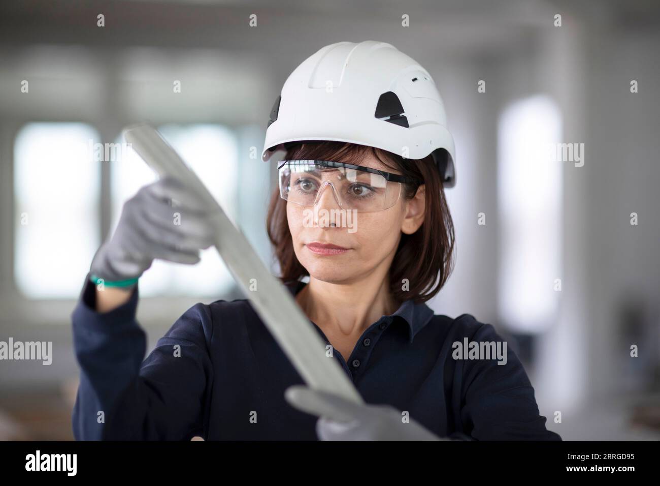 Engineer in safety gloves helmet hi-res stock photography and images ...