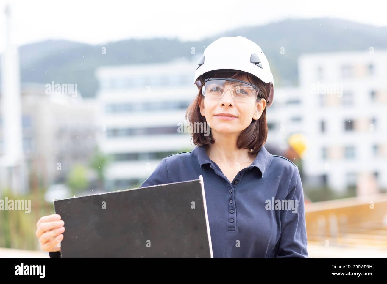 Working blue helmet hi-res stock photography and images - Alamy