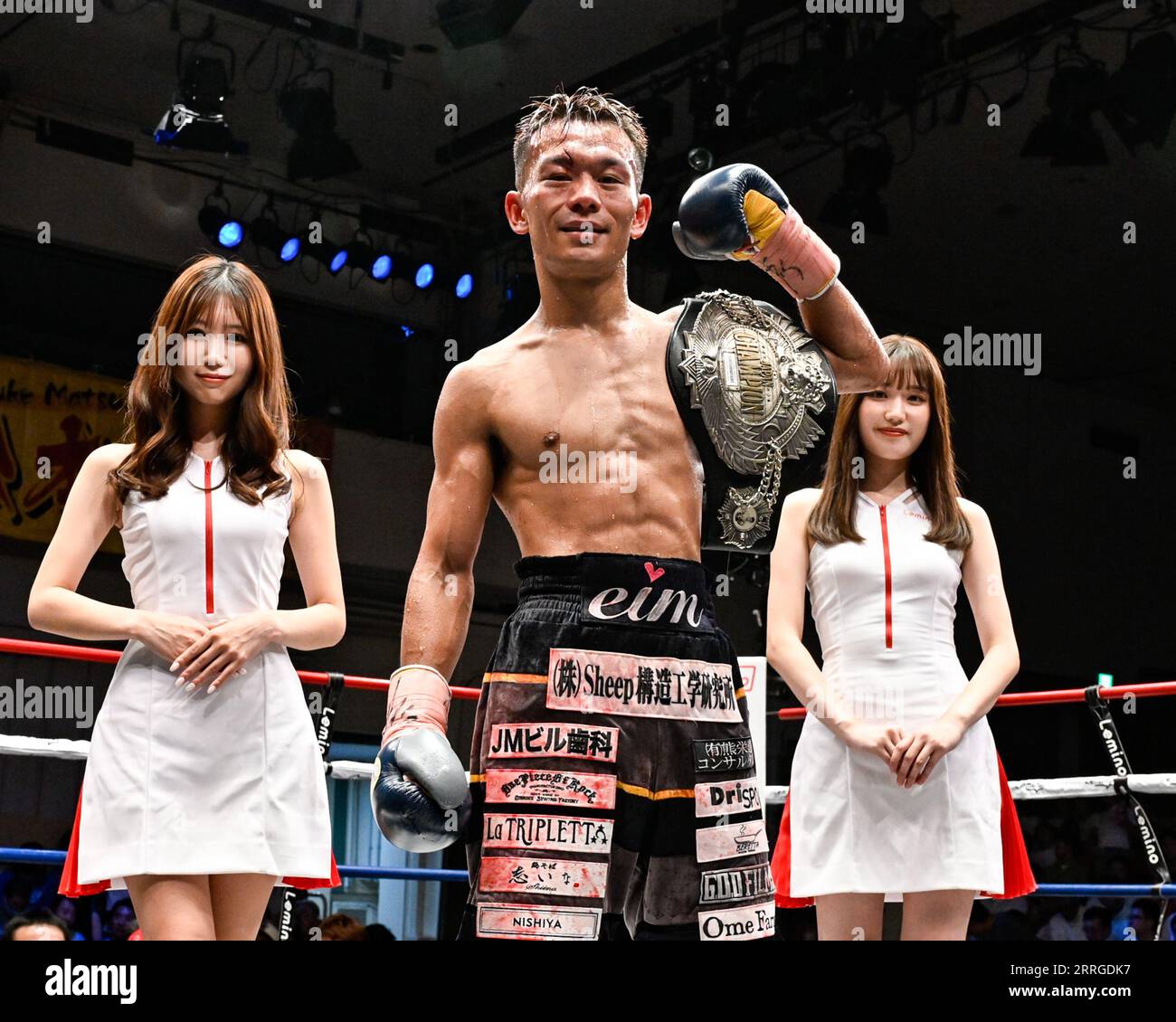 Tokyo, Japan. 30th Aug, 2023. Seiya Tsutsumi, center, poses with ring ...