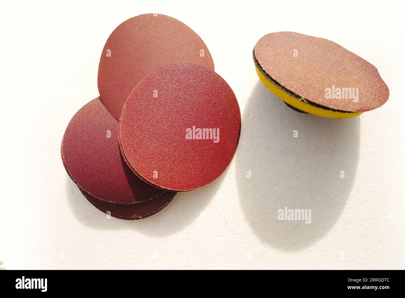 Close up round sandpaper isolated on white background Stock Photo - Alamy