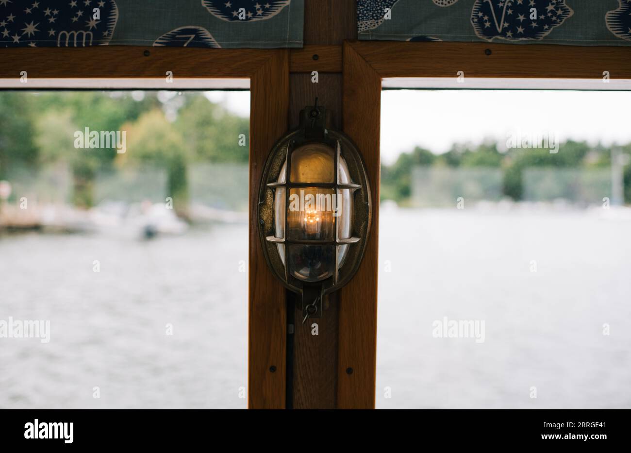 glowing light on a ferry boat at sea Stock Photo - Alamy