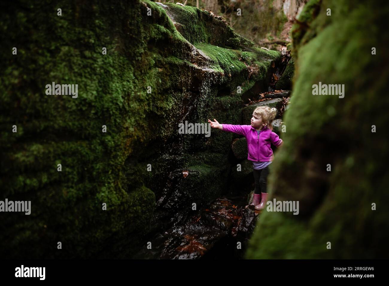 Girl under waterfall hi-res stock photography and images - Alamy