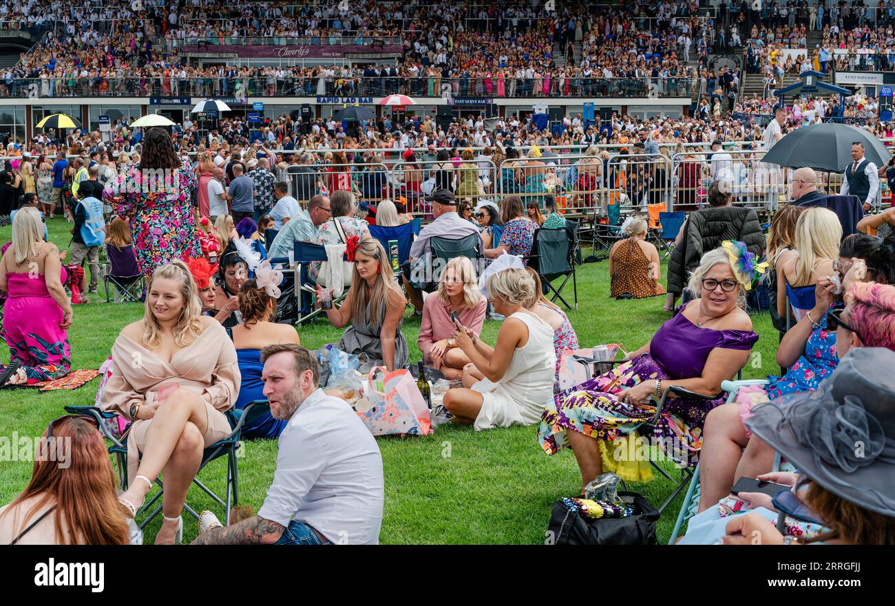 Crowds of people enjoy Ladies Day at the races in Beverley, Yorkshire ...