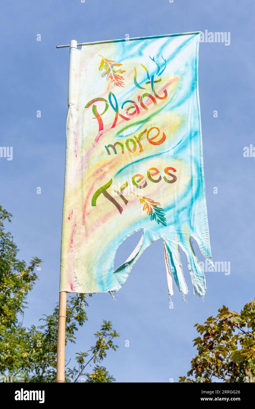 Flag with plant more trees message hi-res stock photography and images ...