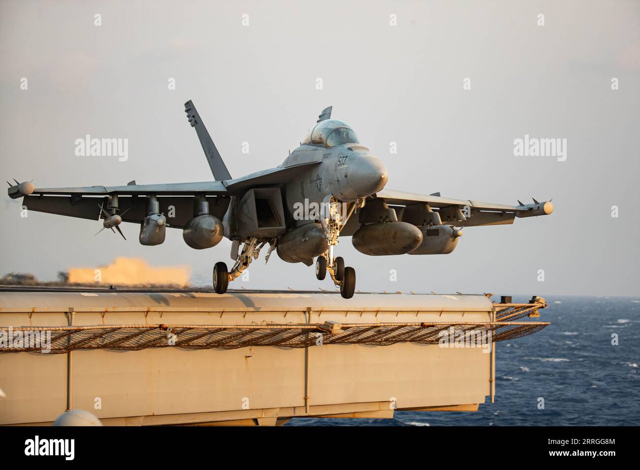 An E/A-18G Growler launches from the flight deck of the USS Gerald R ...