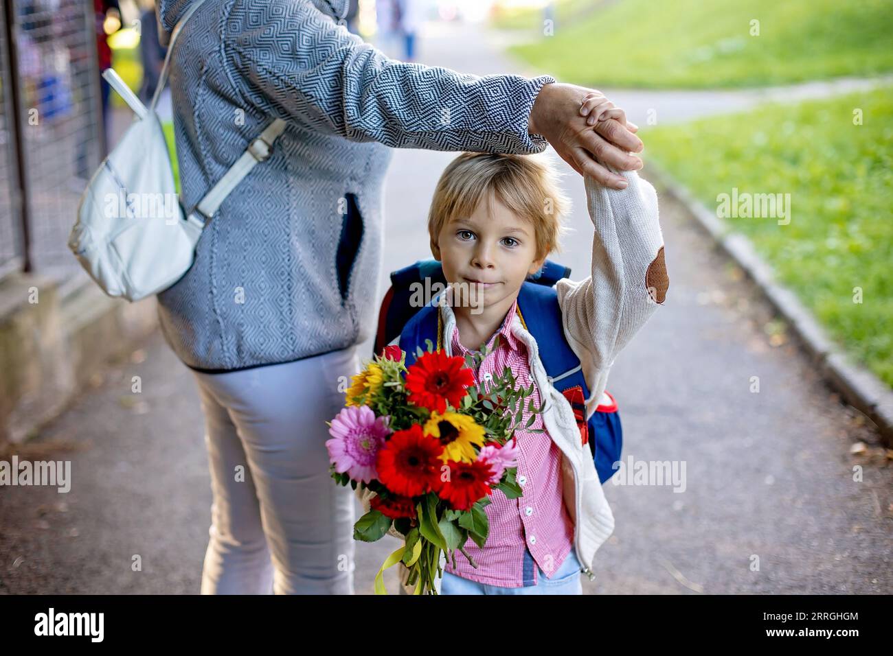 First day at school for a firstgraden, child starting school, bringing ...