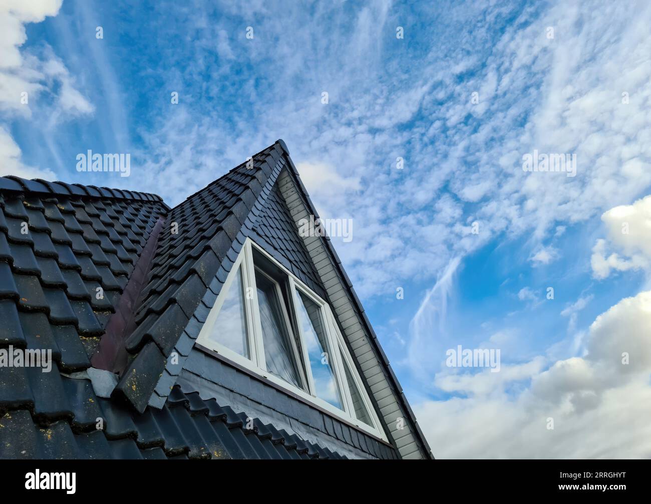 Open Roof Window In Velux Style With Black Roof Tiles Stock Photo - Alamy