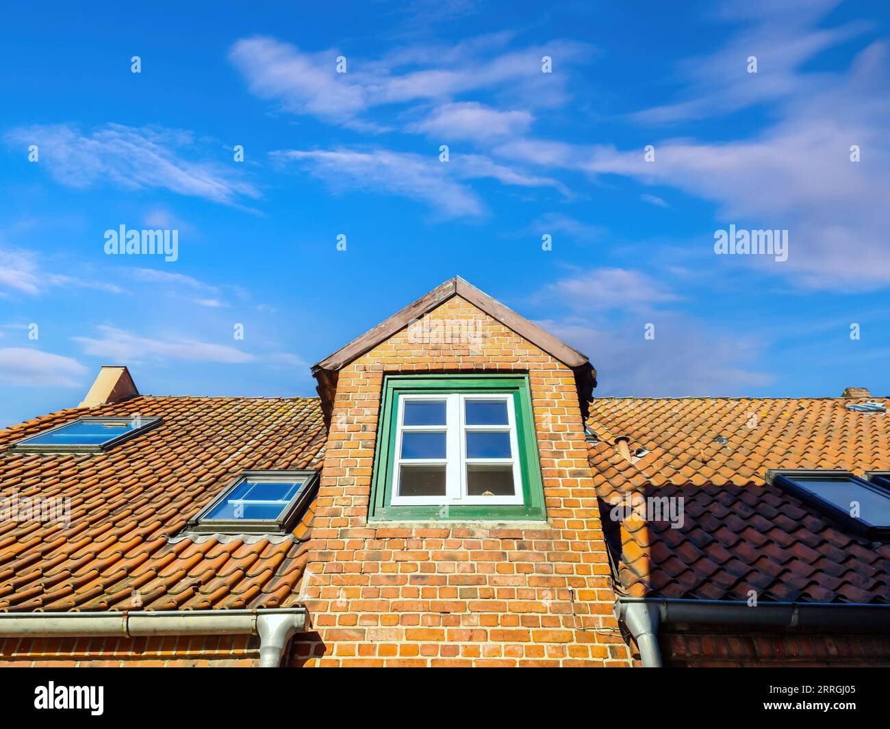 Open Roof Window In Velux Style With Black Roof Tiles Stock Photo - Alamy