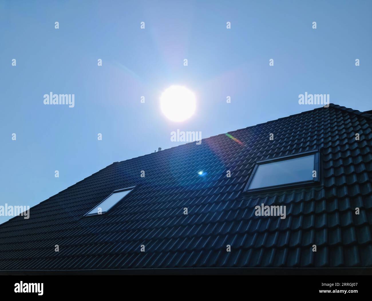 Open Roof Window In Velux Style With Black Roof Tiles Stock Photo - Alamy
