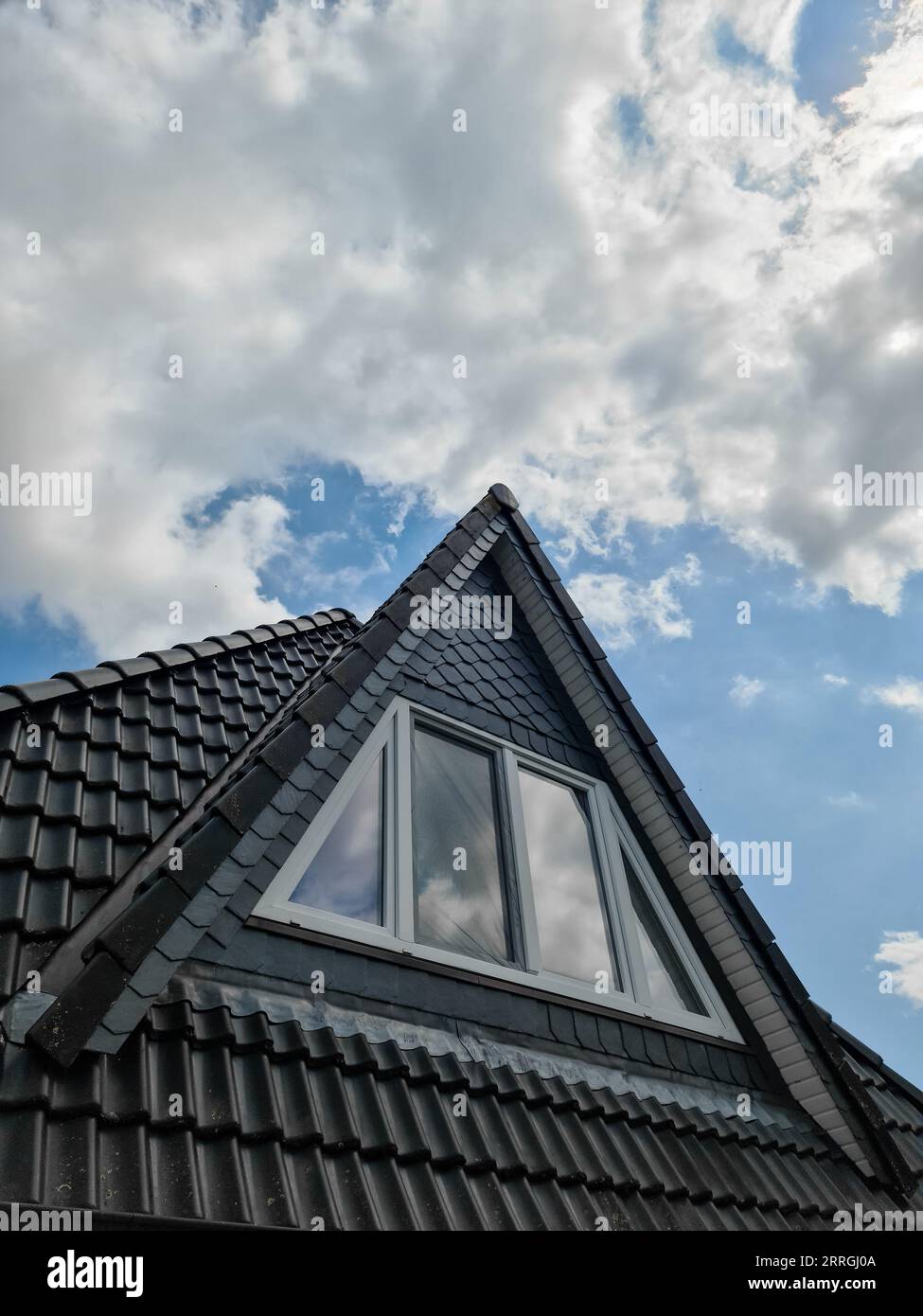 Open Roof Window In Velux Style With Surrounding Black Roof Tiles Stock ...