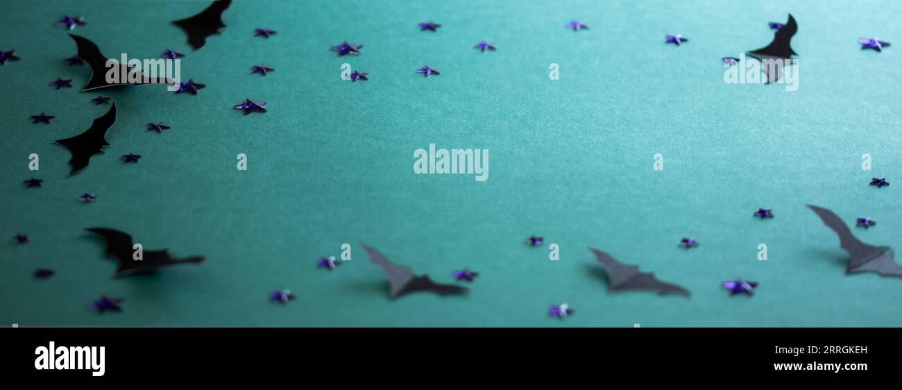 Halloween paper decorations, bats and stars in the night blue sky Stock ...