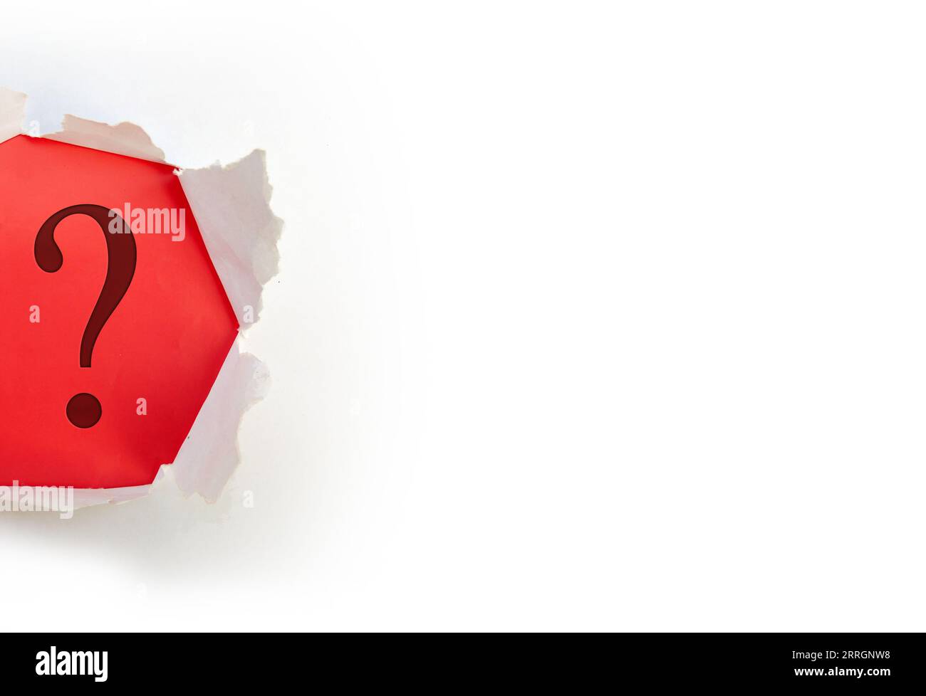 Torn out white paper with question mark symbol. White torn paper ...
