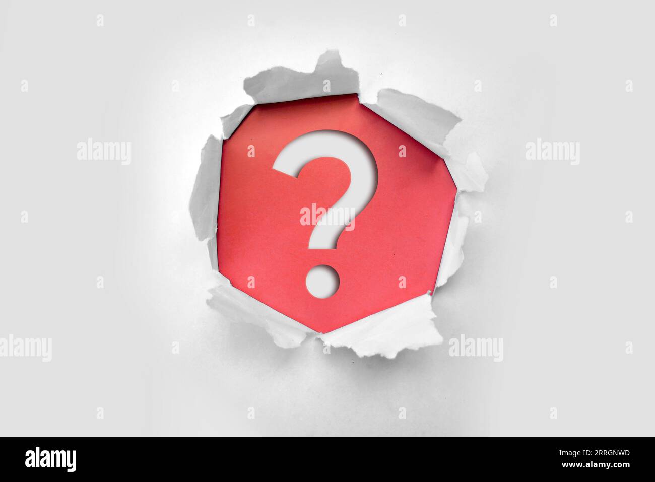 Torn out white paper with question mark symbol. White torn paper ...