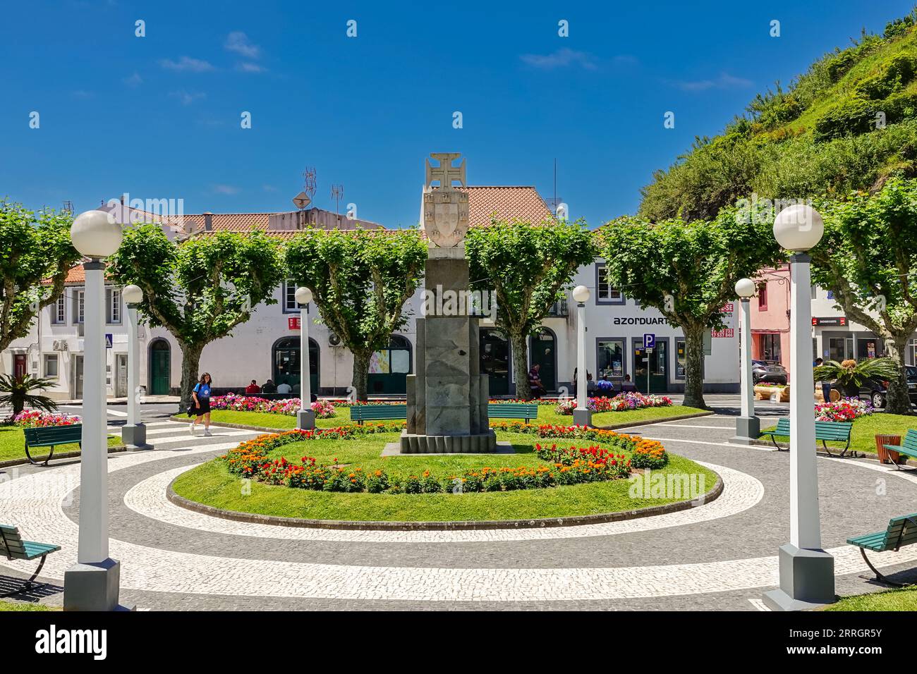 Town square and garden with a monument to the First Settlers at the ...
