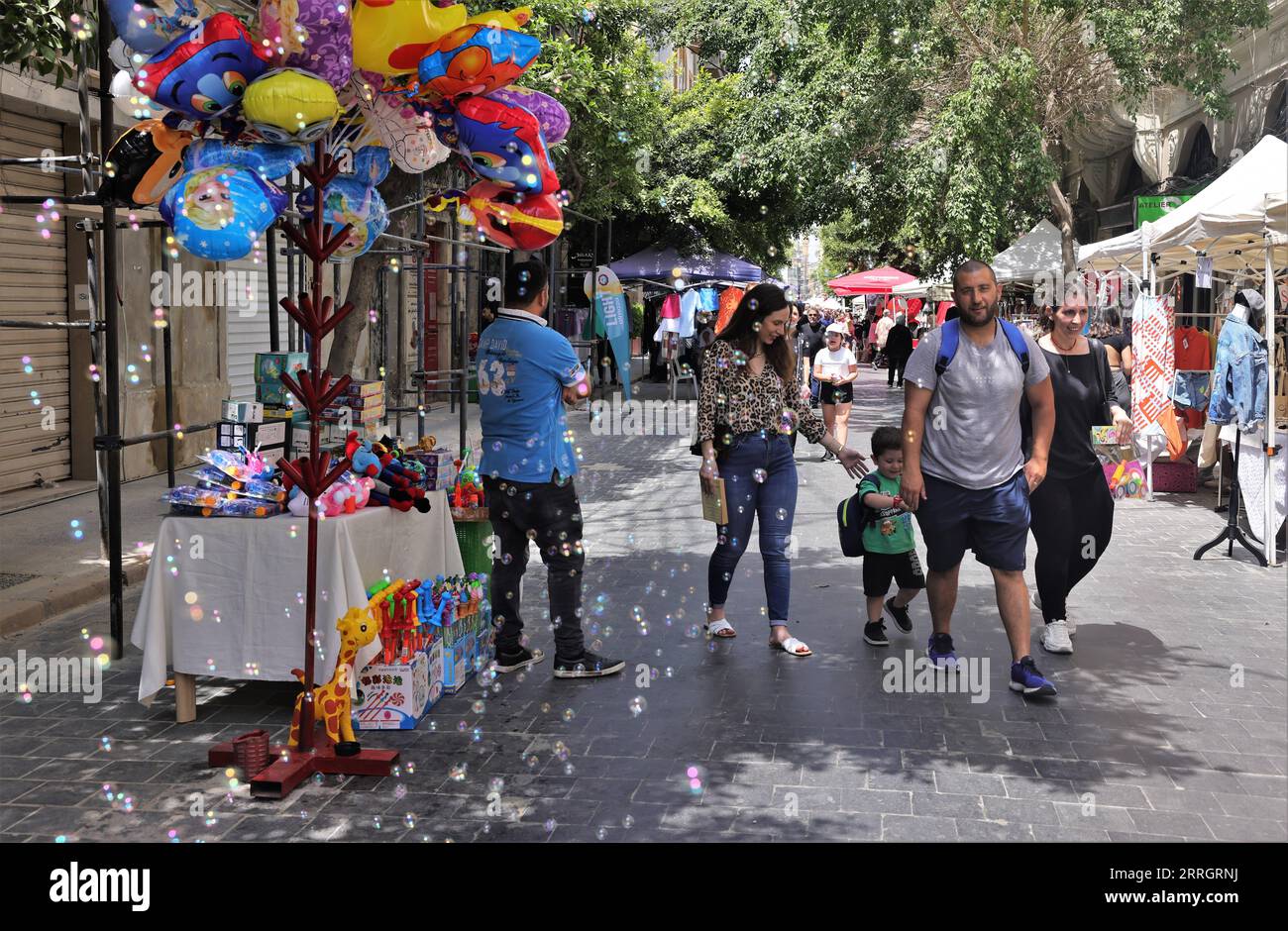 220530 -- BEIRUT, May 30, 2022 -- People visit Gemmayze Street fair in ...